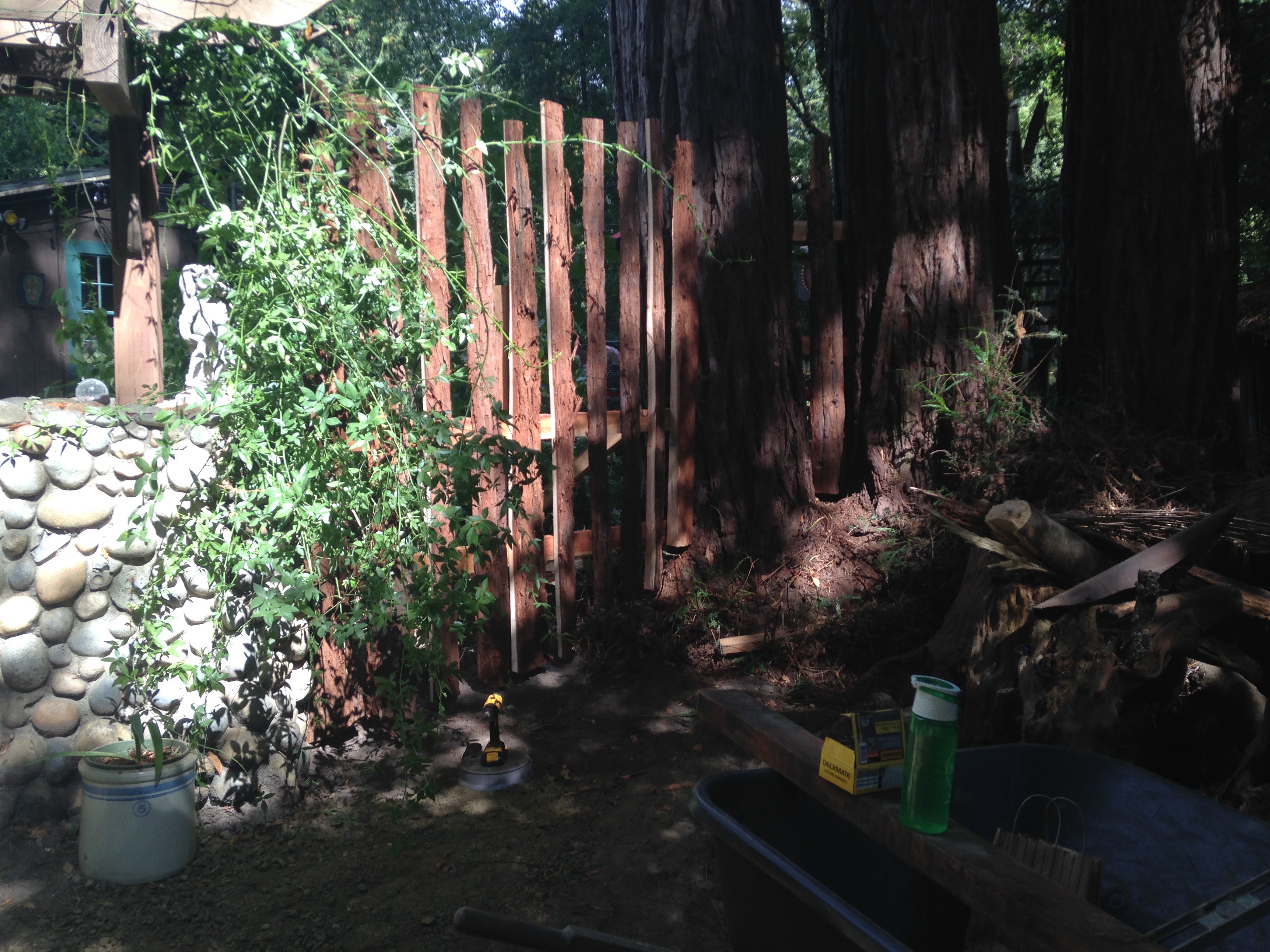 Front Entrance Redwood Bark Fence | lovecreekfarm